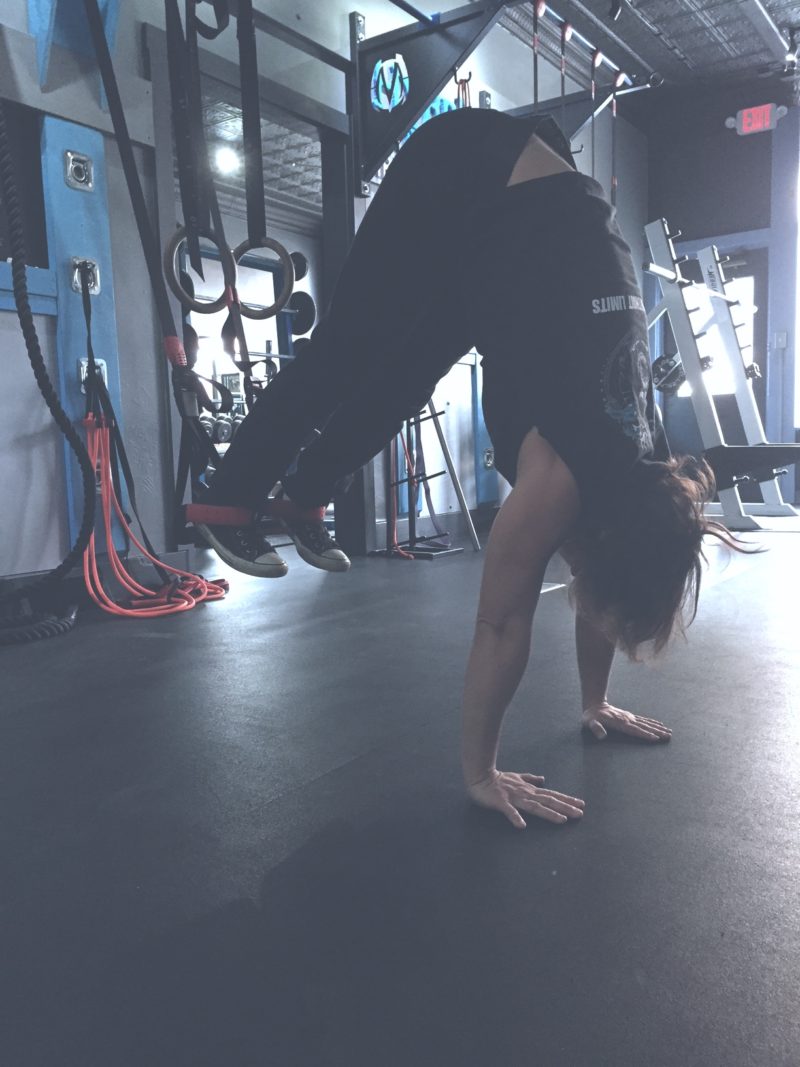 How to Perform a Suspended Abdominal Pike - Hybrid Movement